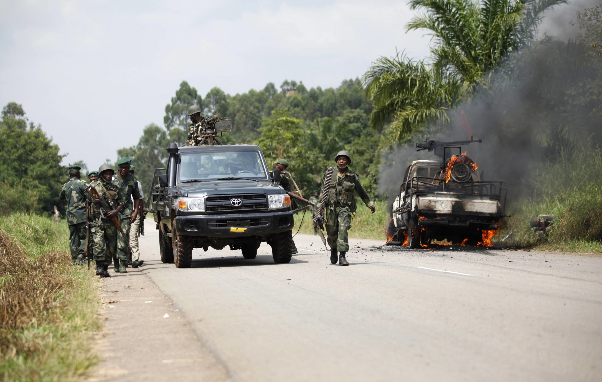 ADF Rebels Set 2 Trucks Ablaze After Attacking Ofaye In DR Congo - HumAngle